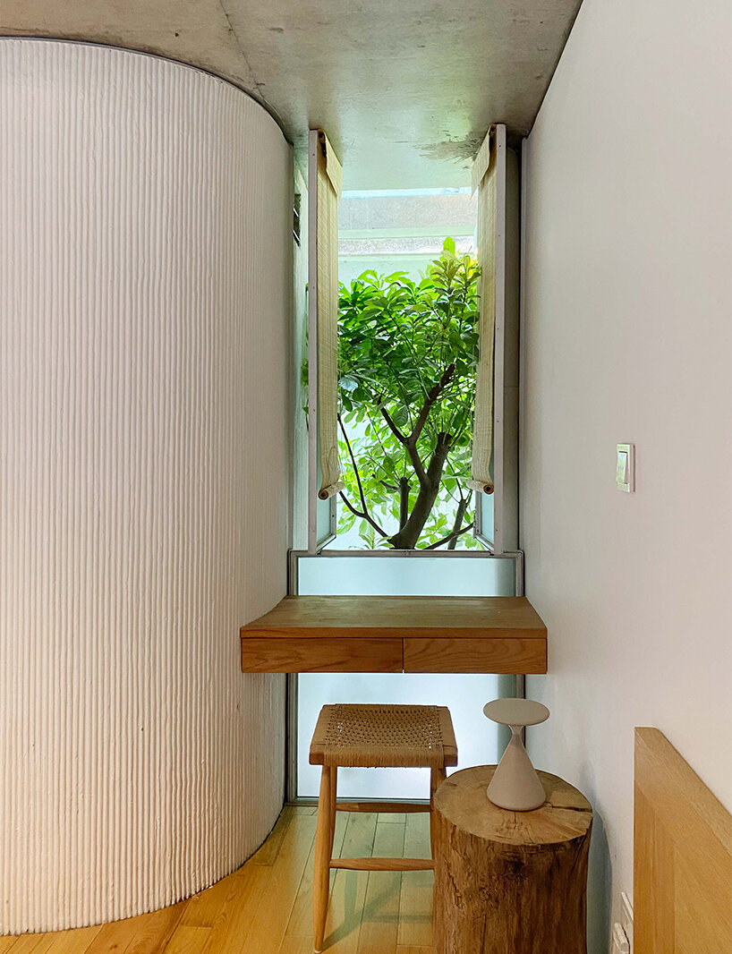 TH house by ODDO architects is a narrow five-storey residence in hanoi