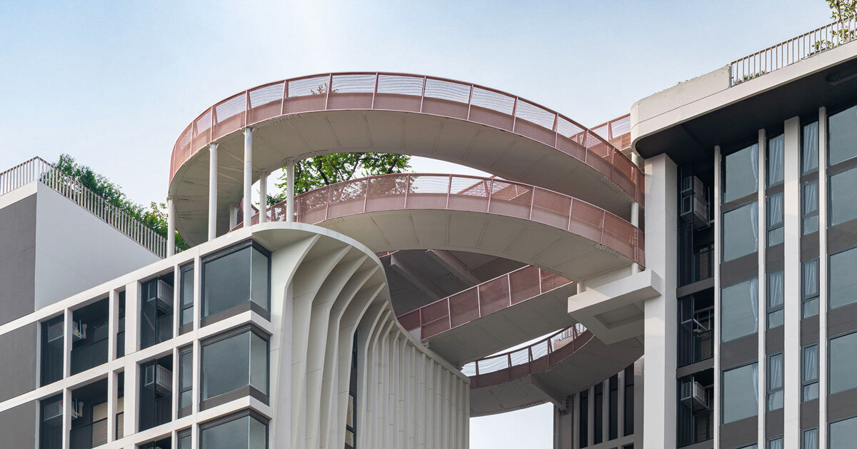 openbox architects inserts rose gold spiral ramp between two ...