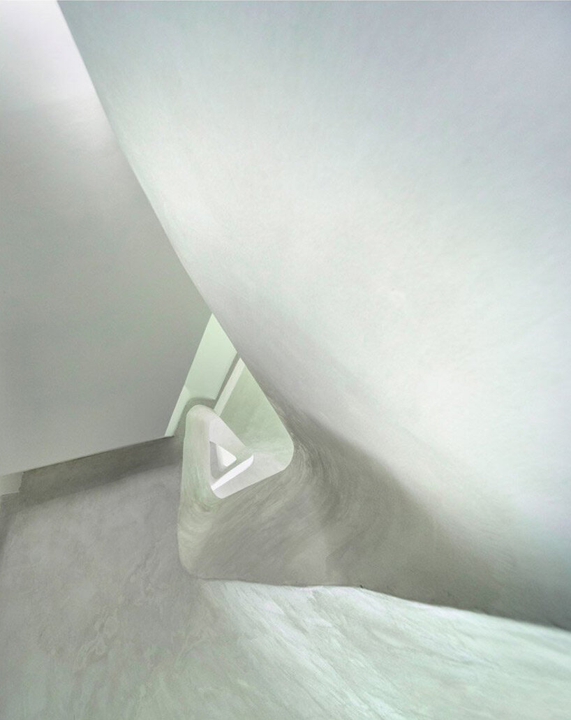 avignon architecte builds 'twist' house with sculptural staircase in ...