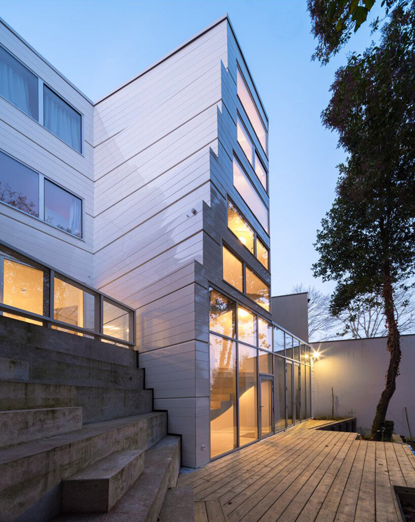 avignon architecte builds 'twist' house with sculptural staircase in ...