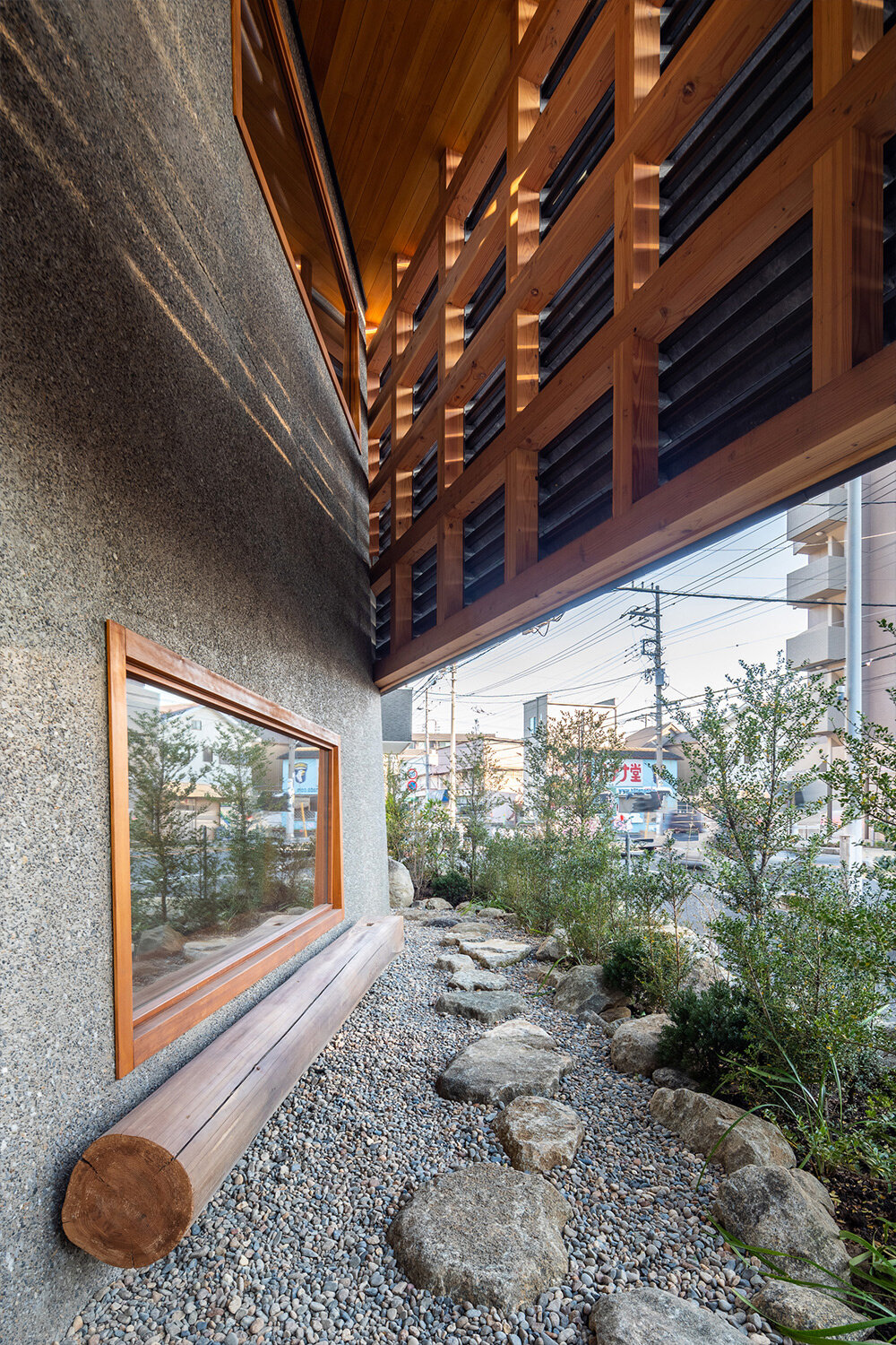 seven staggered volumes by KOMPAS accommodate family house and gallery ...