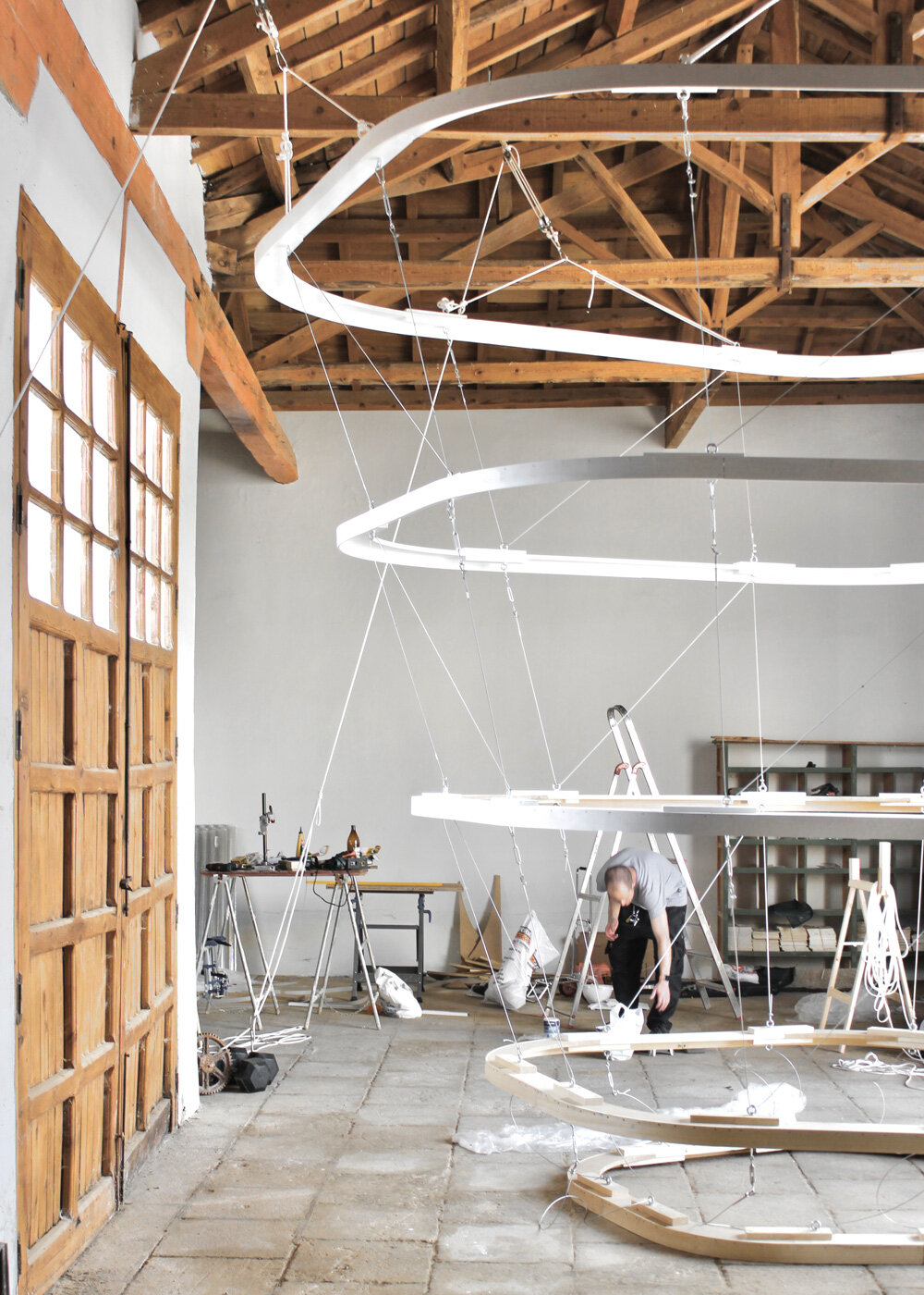 monumental lamp installation lights up the main patio of a 17th century ...