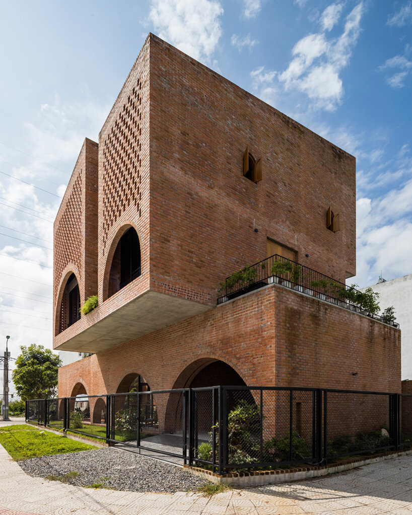 this 'cuckoo house' by tropical space is a dwelling perched atop a café