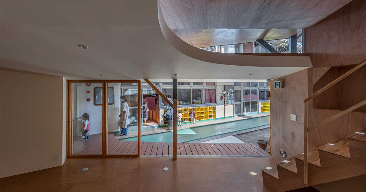 maki yoshimura builds nursery extension between two retaining walls in ...