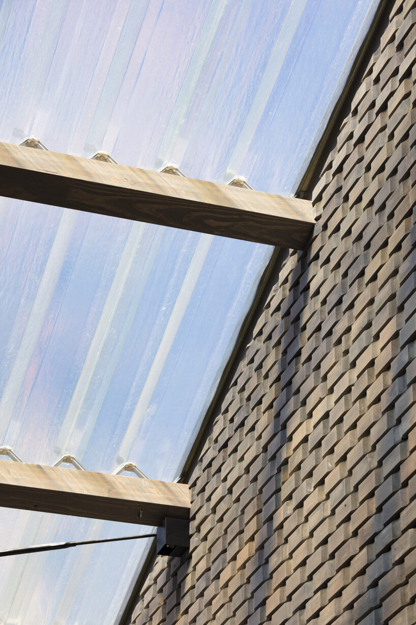 sato+ lodges semi-open house with transparent roof into narrow alley in ...