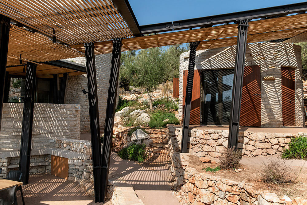 hiboux architecture nestles cluster of scattered curved volumes in ...