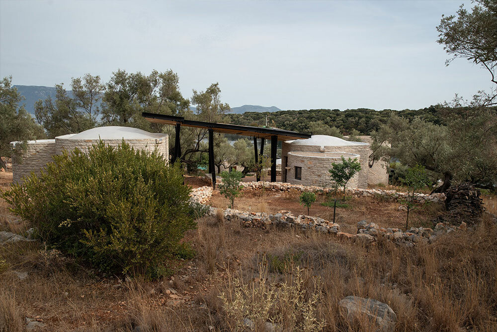 hiboux architecture nestles cluster of scattered curved volumes in ...