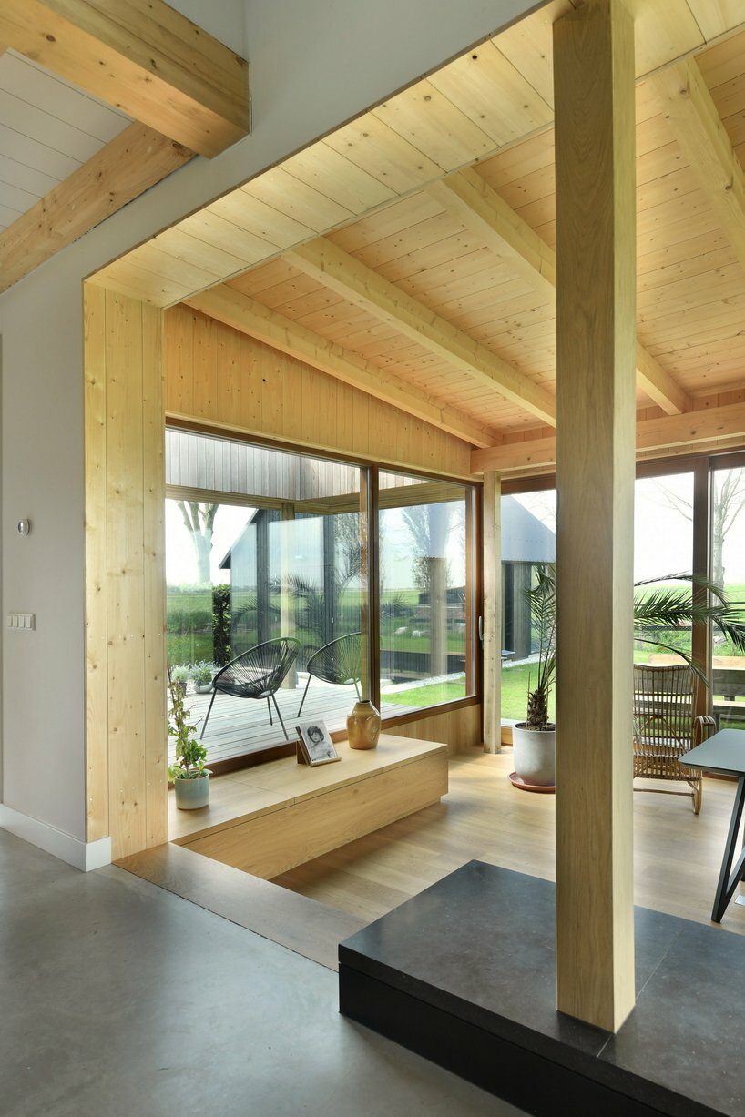 HOYT architecten assemble barn house's facade from reclaimed wood