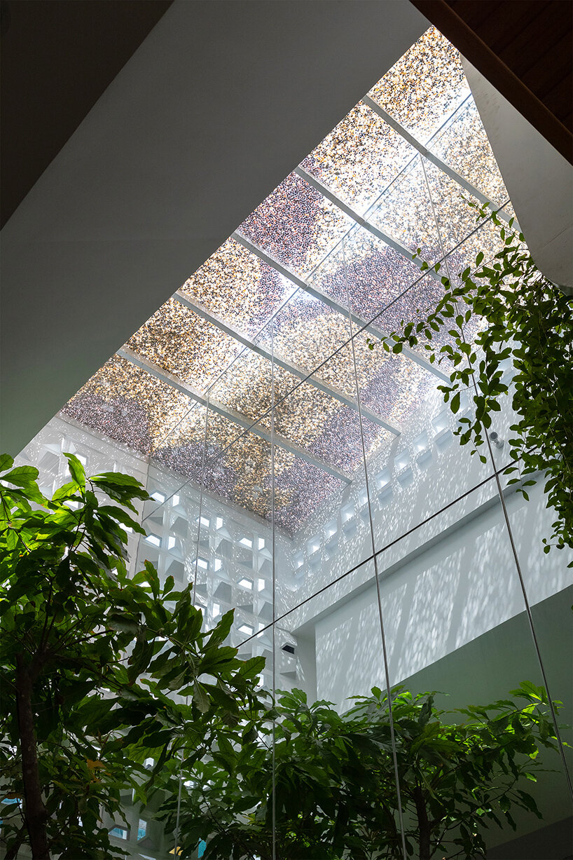 glass-brick 'coco house' in vietnam evokes otherworldly nostalgia