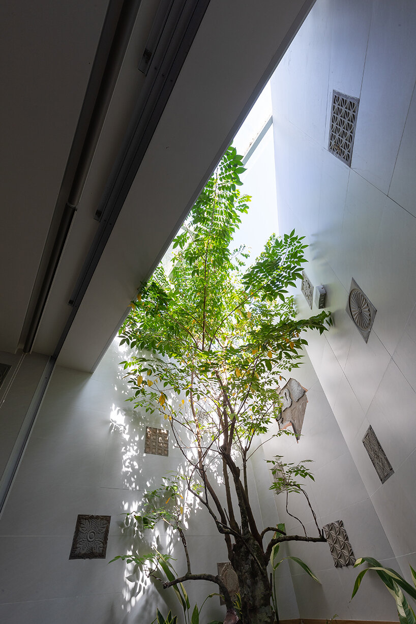 glass-brick 'coco house' in vietnam evokes otherworldly nostalgia