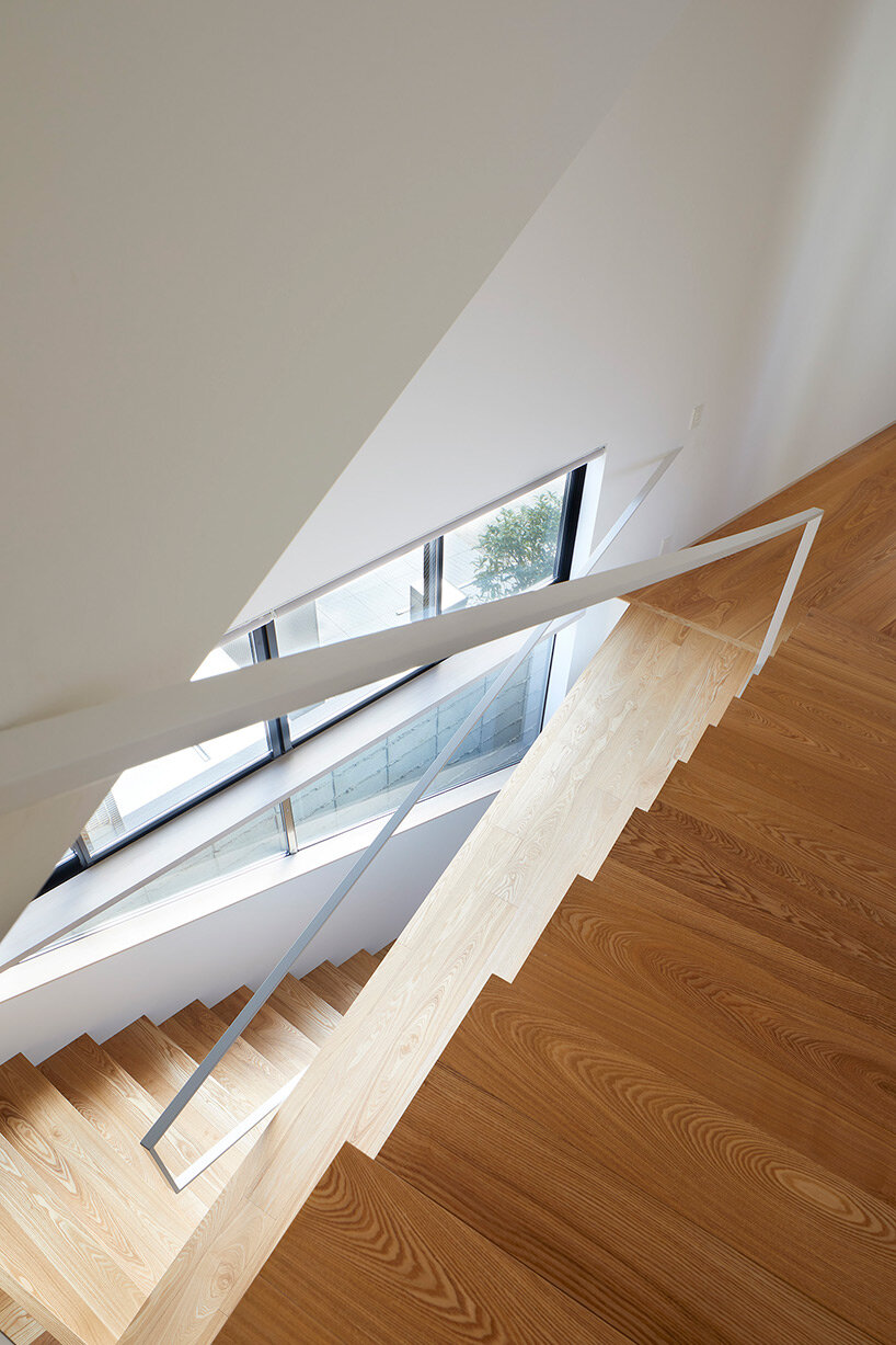 alphaville builds house of stacked tsuboniwa gardens within the urban ...