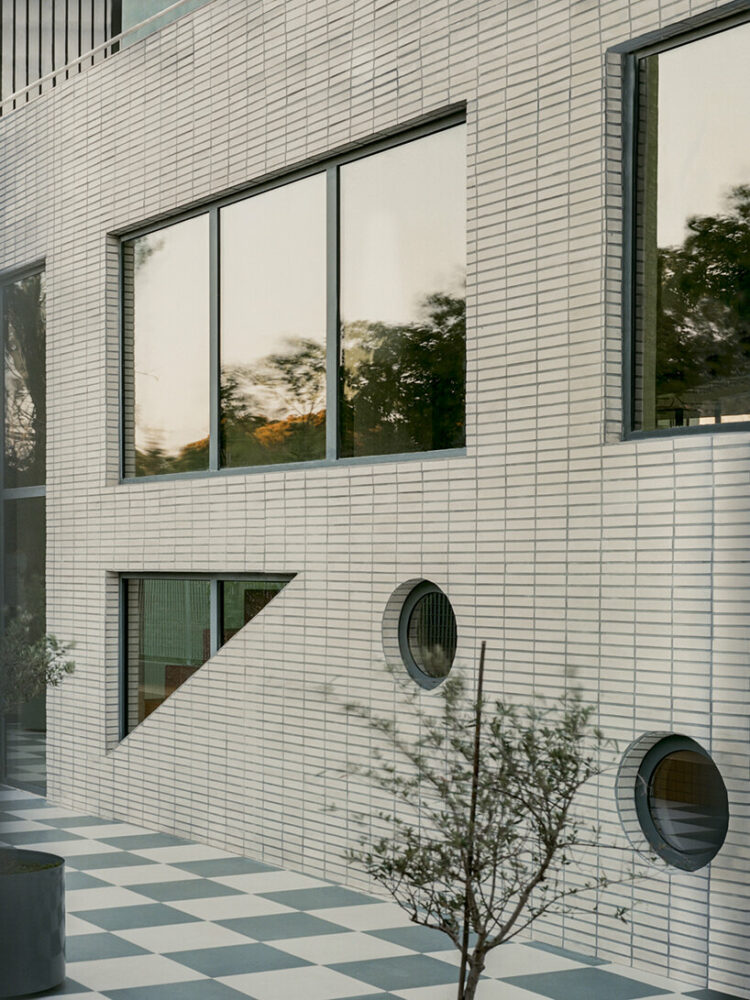 neiheiser argyros revives old office building as multicolored blocks