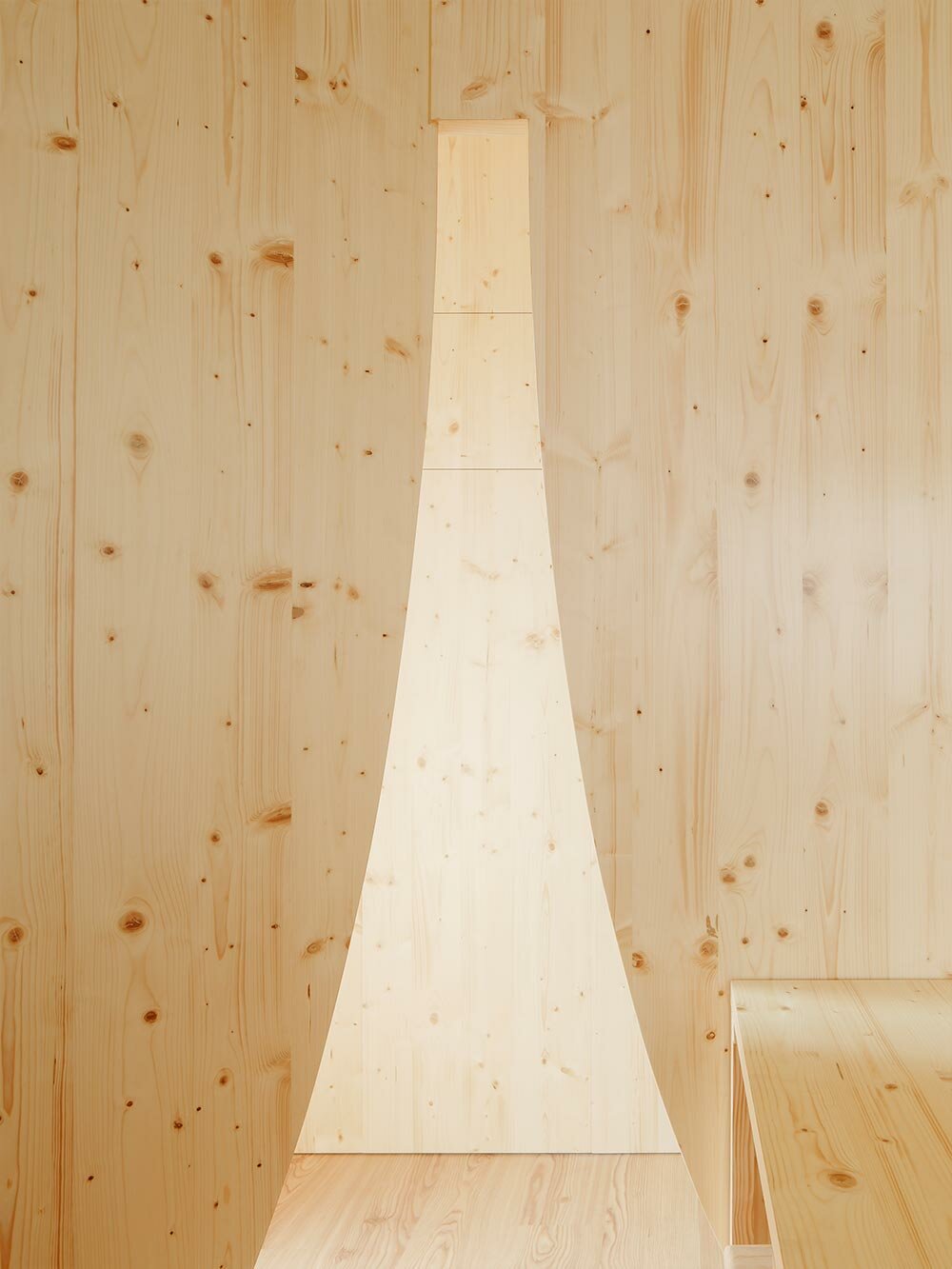 funnel-shaped cutouts finish snug restaurant in portugal