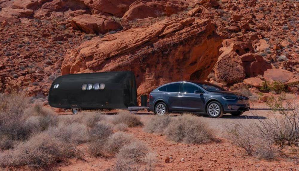 bowlus clads bullet-shaped travel trailer in silver armor
