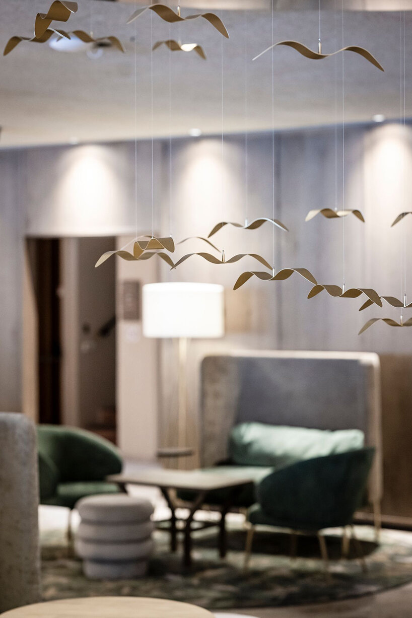 falkensteiner family resort lido gets uplifted with a playful roofscape