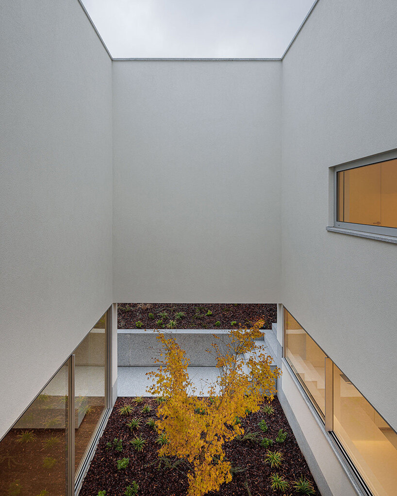 helder da rocha opens its santa marinha house with a sunlit garden