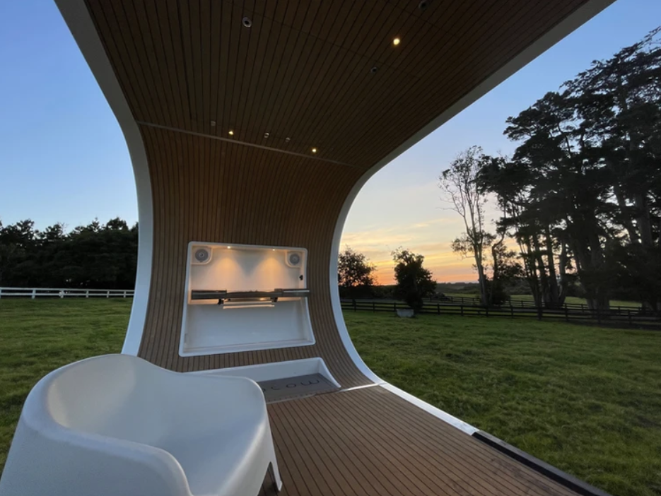 romotow camping trailer swivels out to form spacious deck lounge