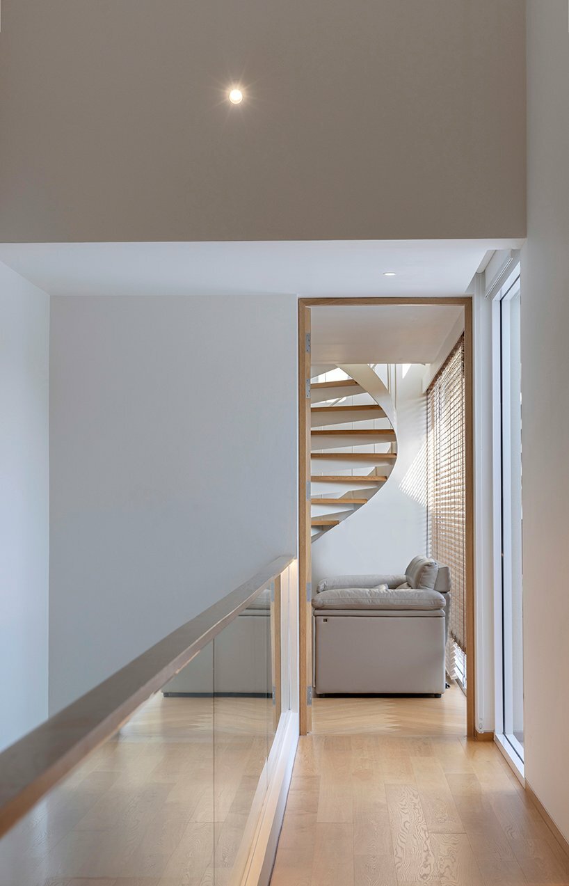 austere geometric volumes compose white 'rupu house' in bangkok