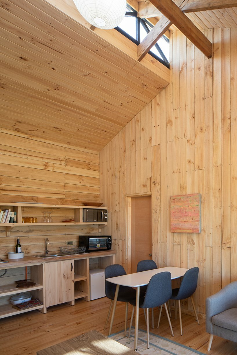 lucas maino fernandez wraps chile home in latticed corridor