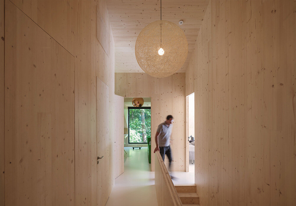 protruding windows bring nature inside spee architecten's sustainable ...