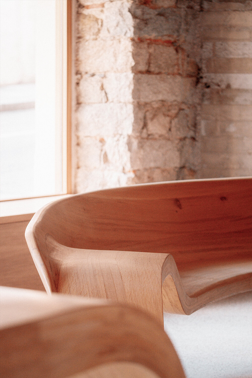 amelia tavella's curvilinear furniture-sculpture hybrid twists from ...