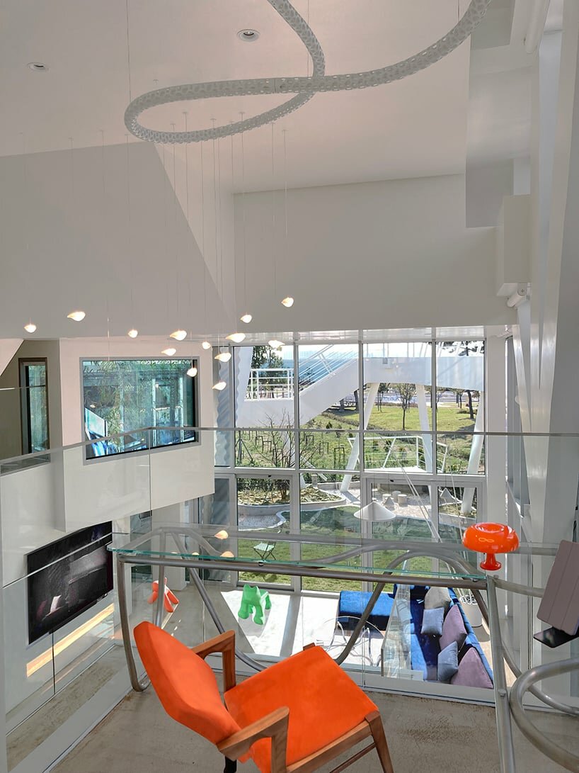 sharp edged white volumes compose IROJE KHM's sailing house in south korea