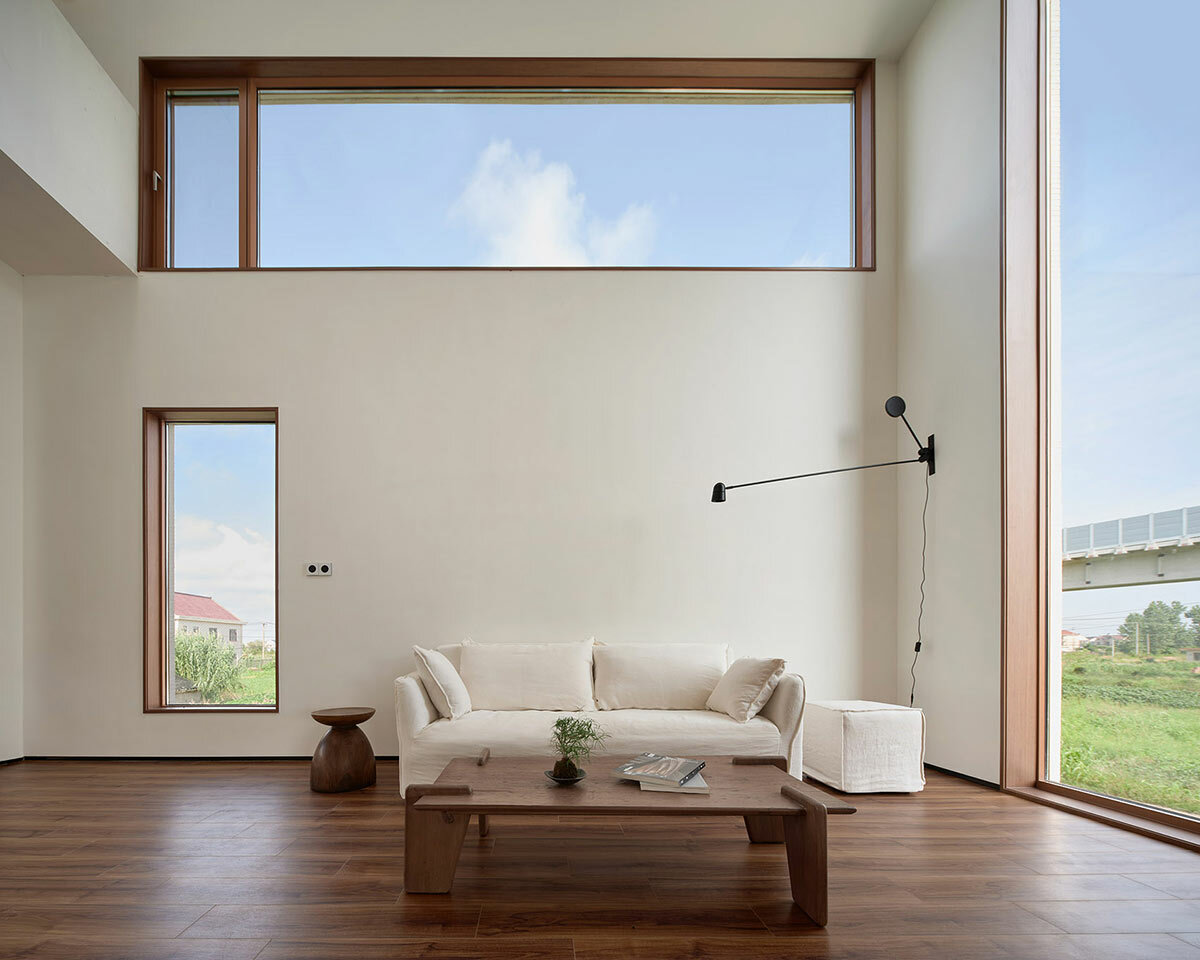 minimalist 'crossing house' built for three generations in rural china