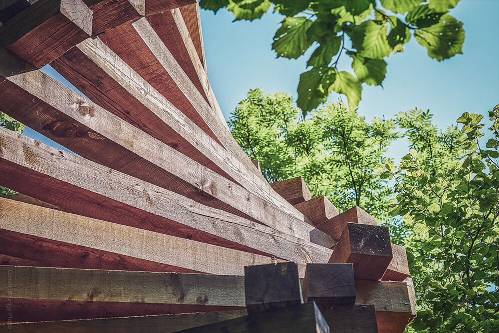davide macullo's interwoven timber pavilions nestle in the swiss alps ...