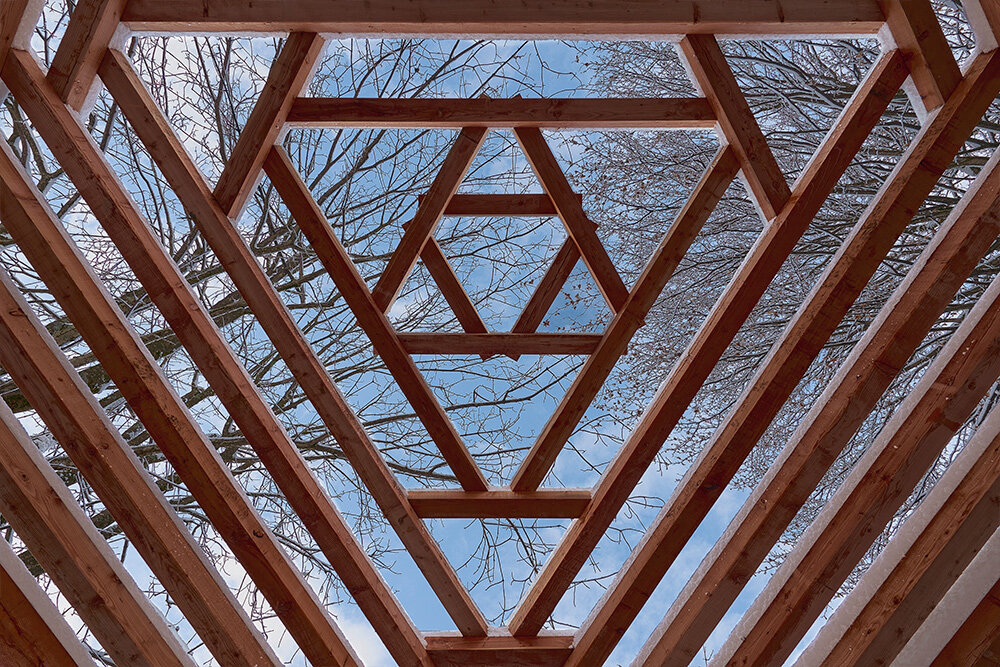 davide macullo's interwoven timber pavilions nestle in the swiss alps ...