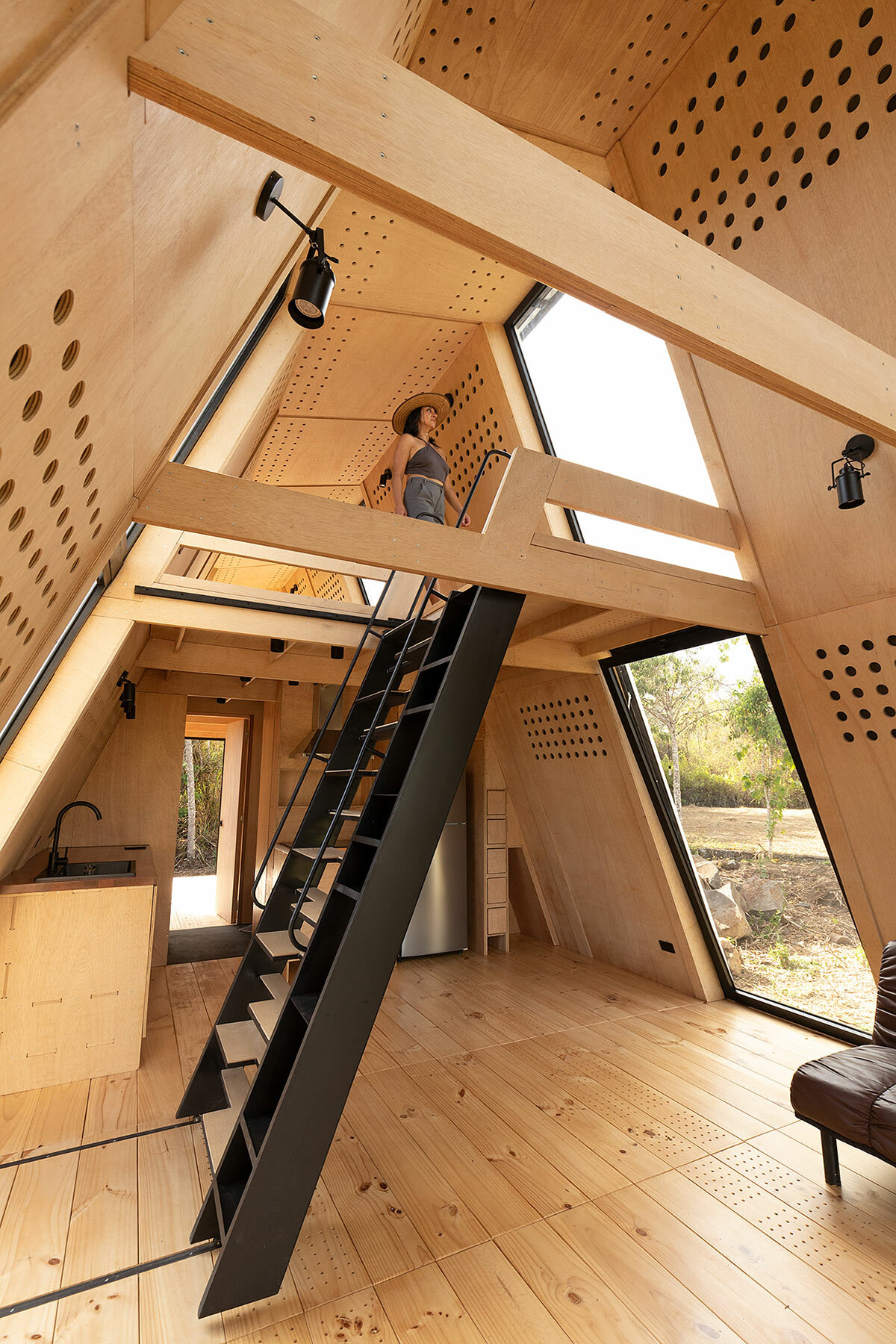 prefab SULA cabin journeys from quito to its galápagos island site
