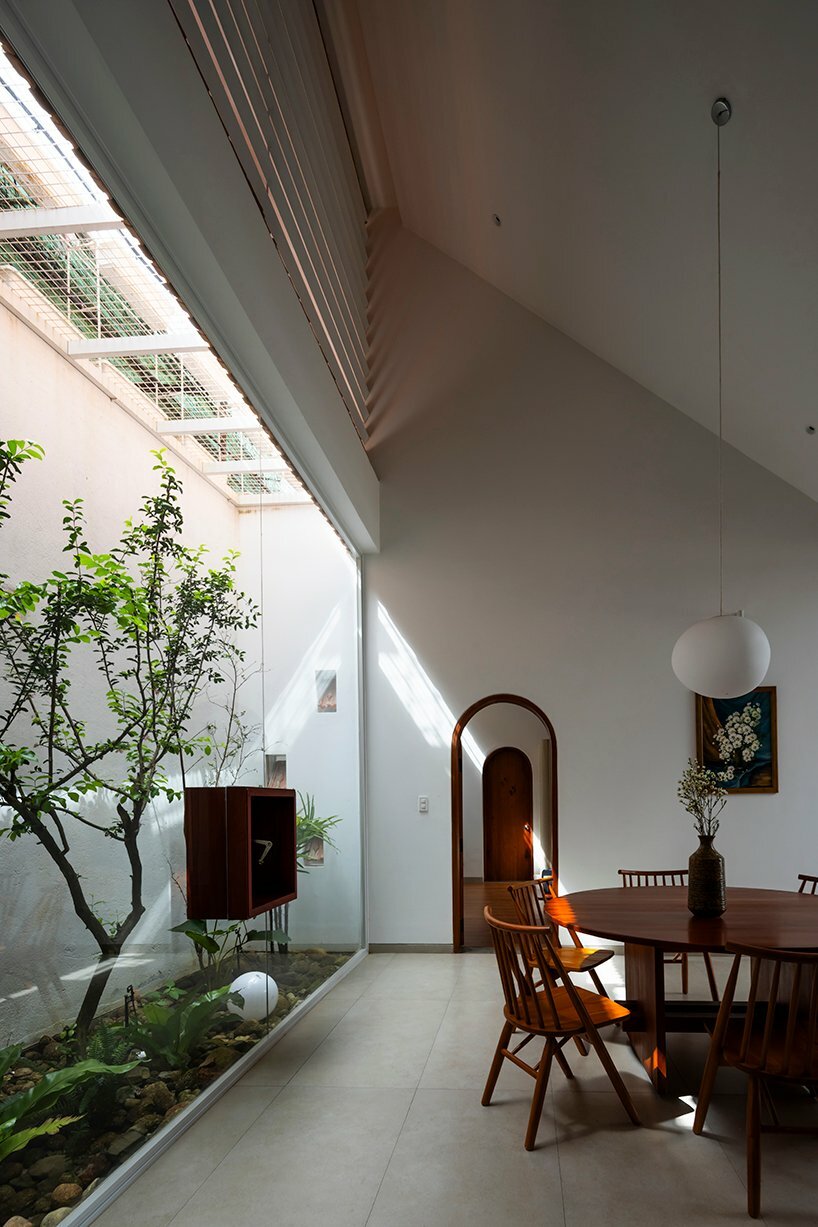 the bloom architects' tile house regulates vietnam's climate