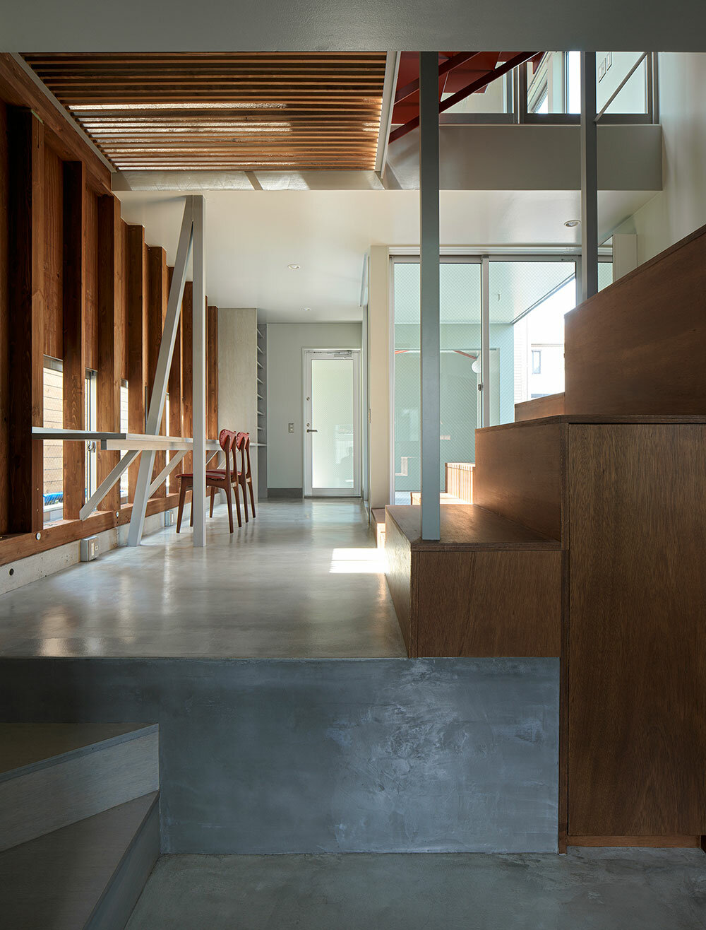 split-level platforms build up archidivision's dance floor house in tokyo