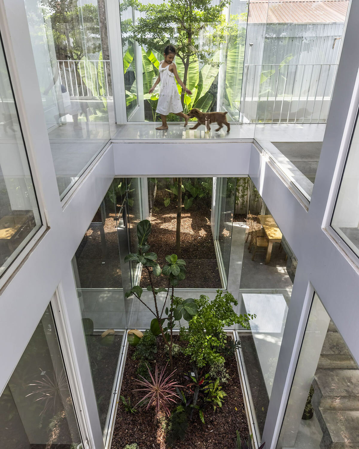 nguyen khai architects infuses 'nala house' with gardens in vietnam