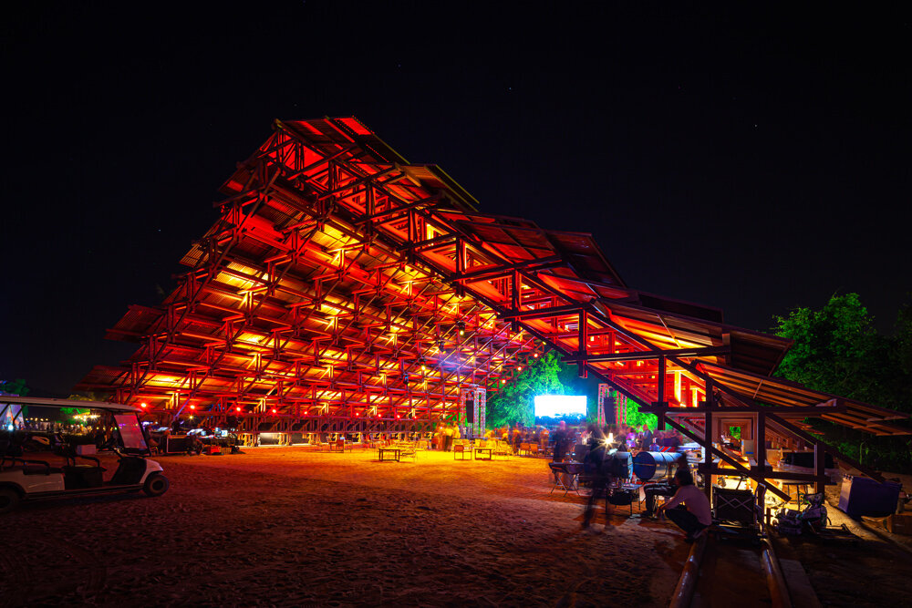 bangkok project studio constructs grand gable roof pavilion for thailand's festival