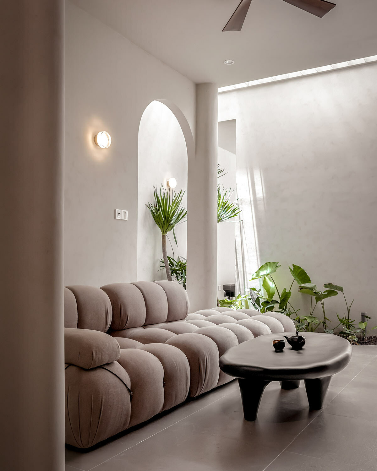 da vàng studio nurtures seven gardens within its nhà voi house