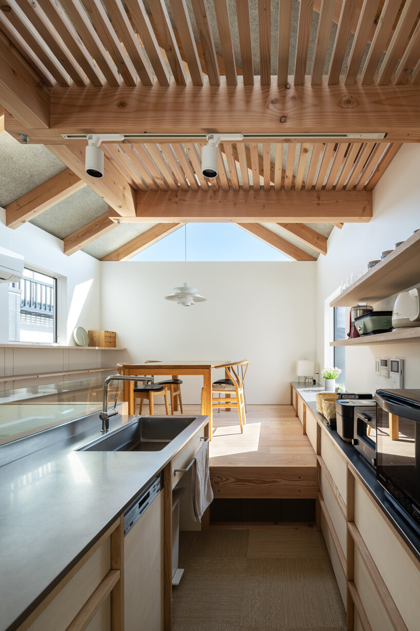 interconnected skipped floors outline compact toneyama house in japan