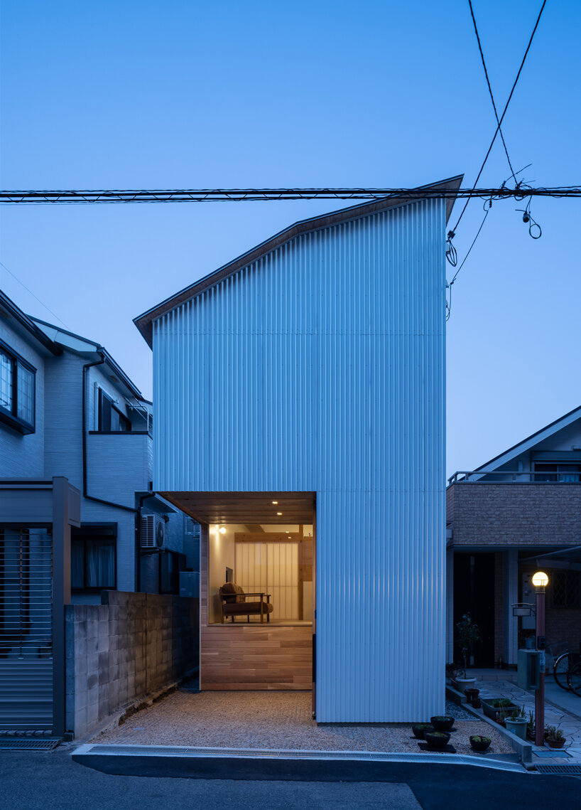 interconnected skipped floors outline compact toneyama house in japan