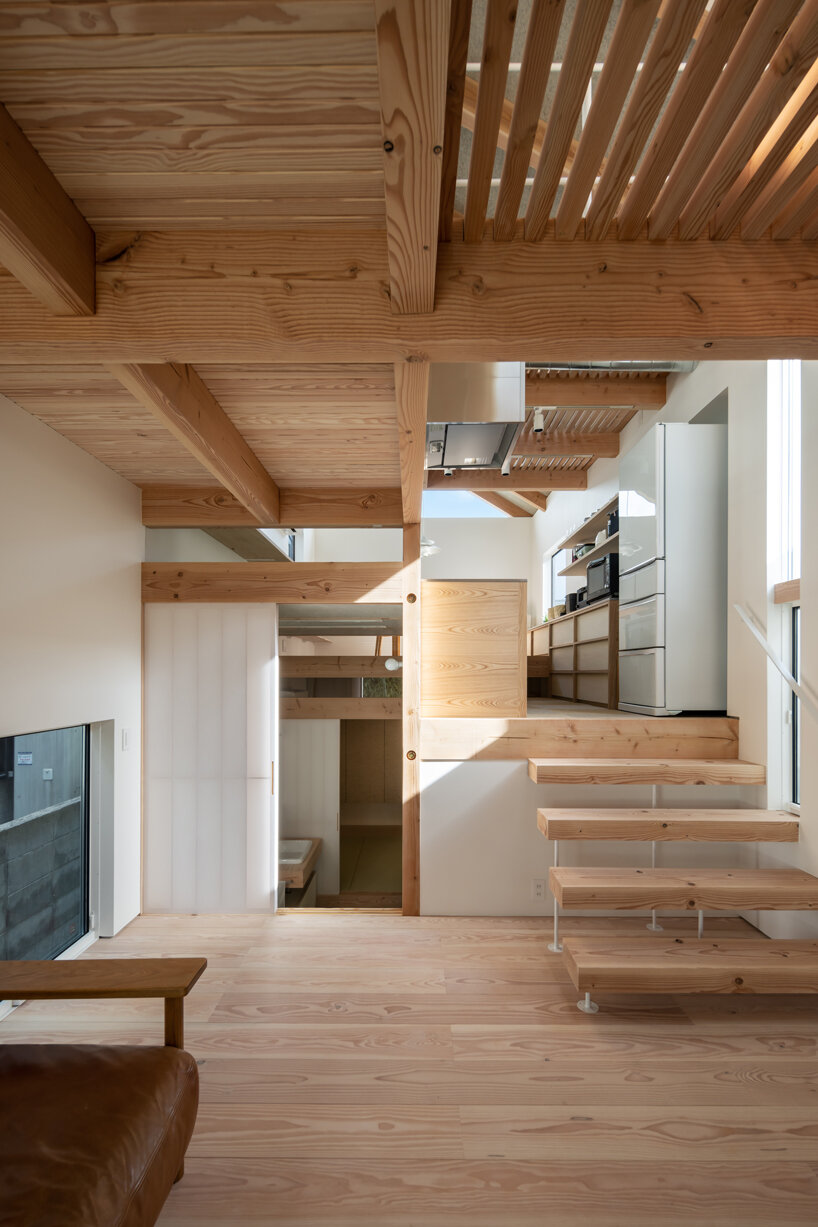 interconnected skipped floors outline compact toneyama house in japan