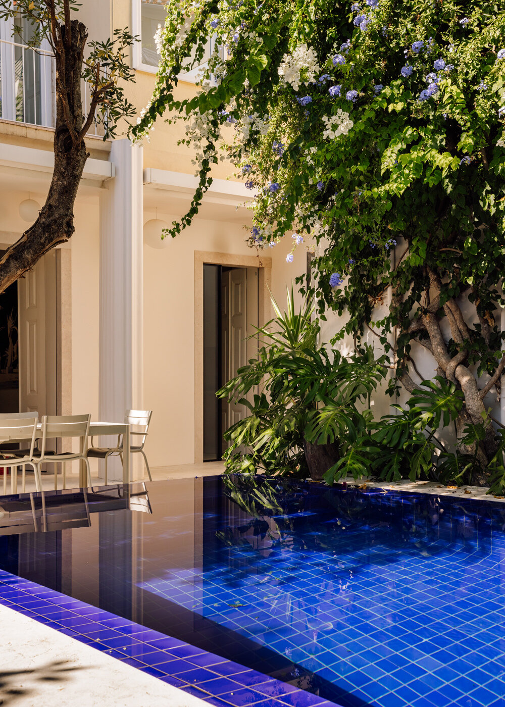 studio gameiro infuses modern touches into historic palmeira apartment ...