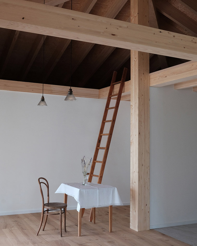 architect charly jolliet tops minimalist alpine house with pyramid roof