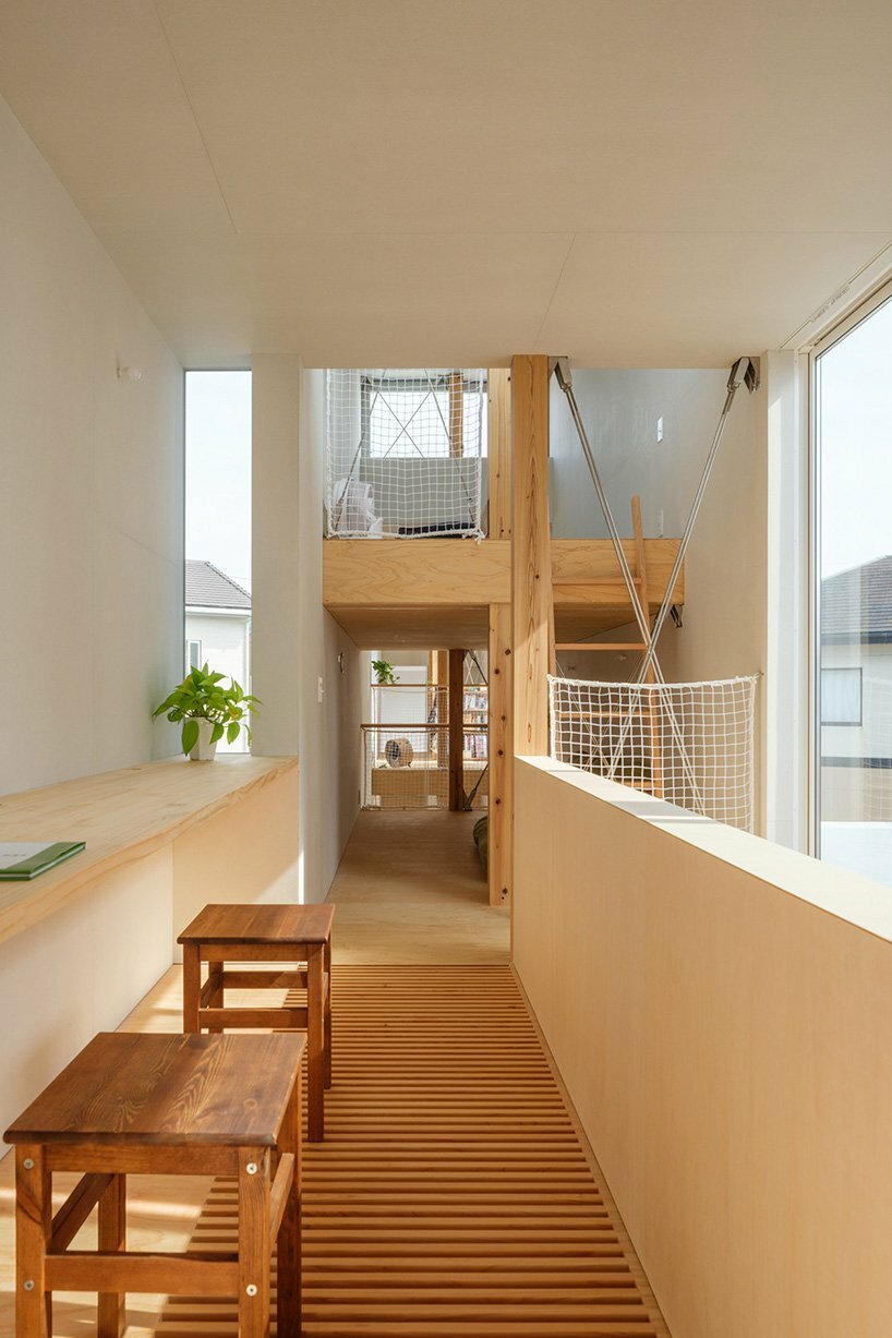 elongated house KJ lies on narrow flagpole lot in japan