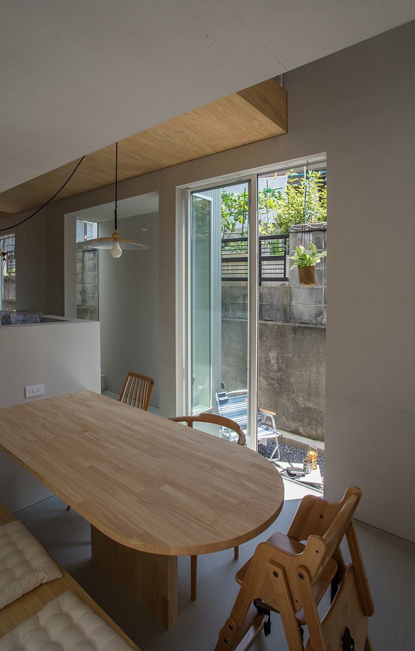 elongated house KJ lies on narrow flagpole lot in japan