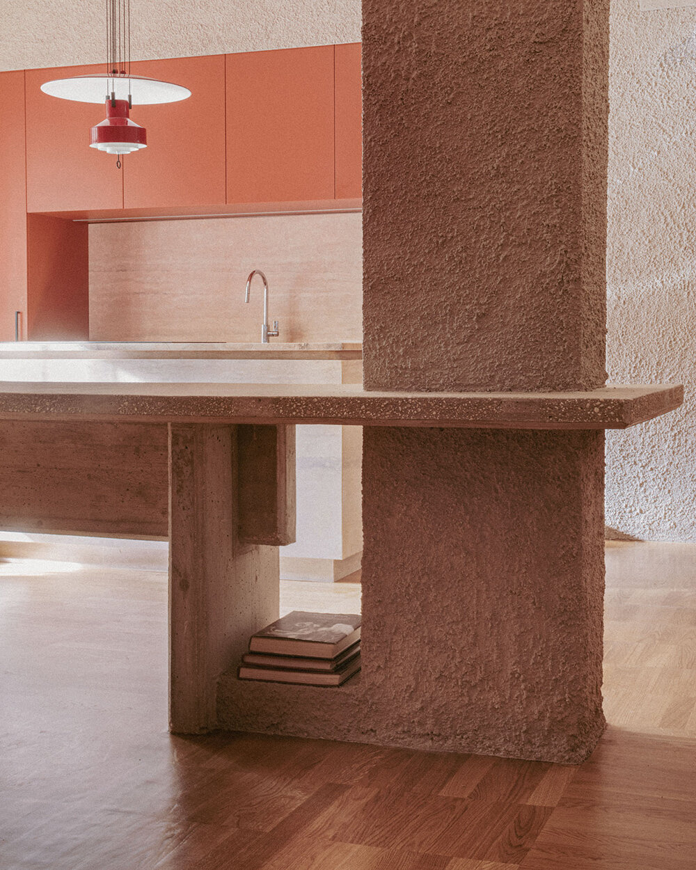 exposed column takes center stage in studio traccia's renovated 1970s flat