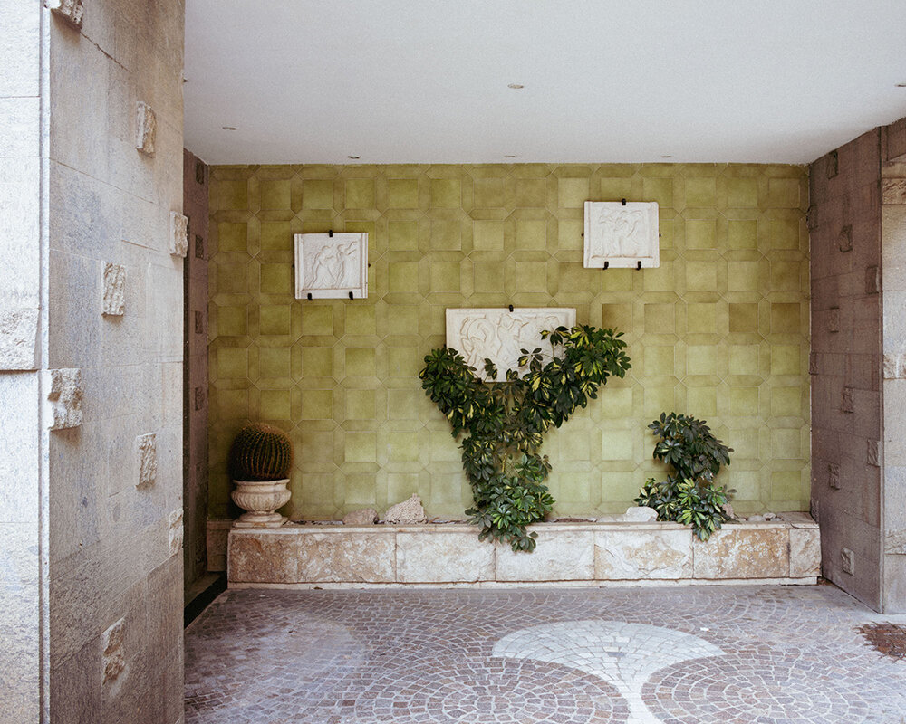 exposed column takes center stage in studio traccia's renovated 1970s flat