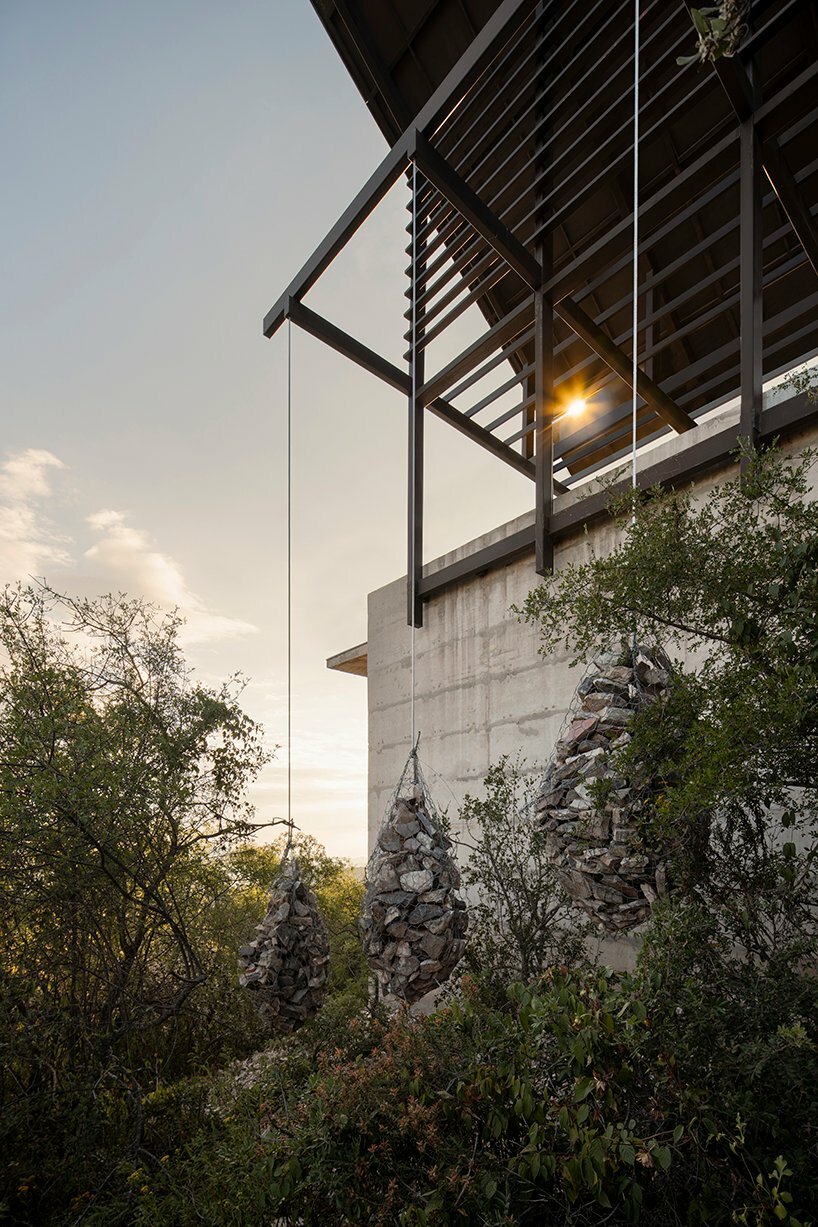suspended gabion masses counterweight steel pavilion in mexico