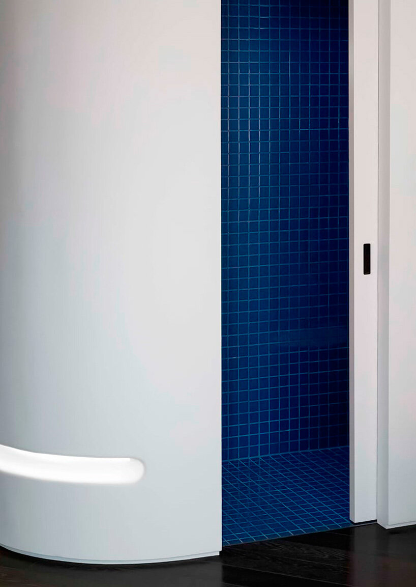 teakwood clads residence's interior in shanghai dedicated to owner's dogs