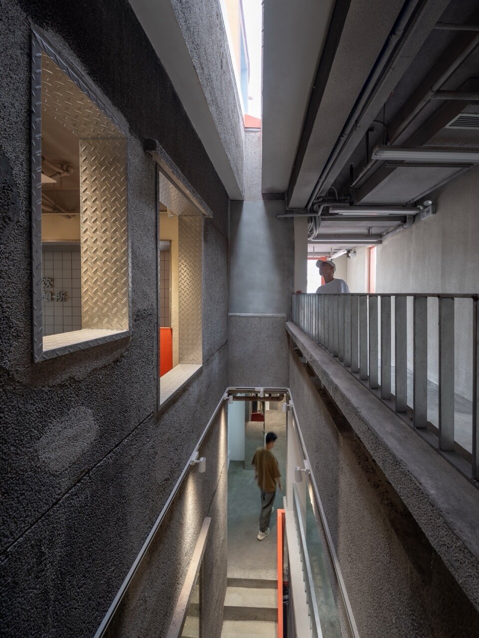 colorful geometric volumes by URBANUS extend atop old building in china