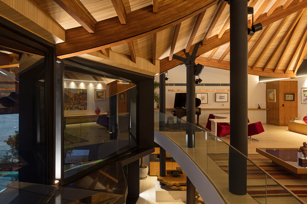 the wave house resembles a vessel sailing through rio de janeiro's waters