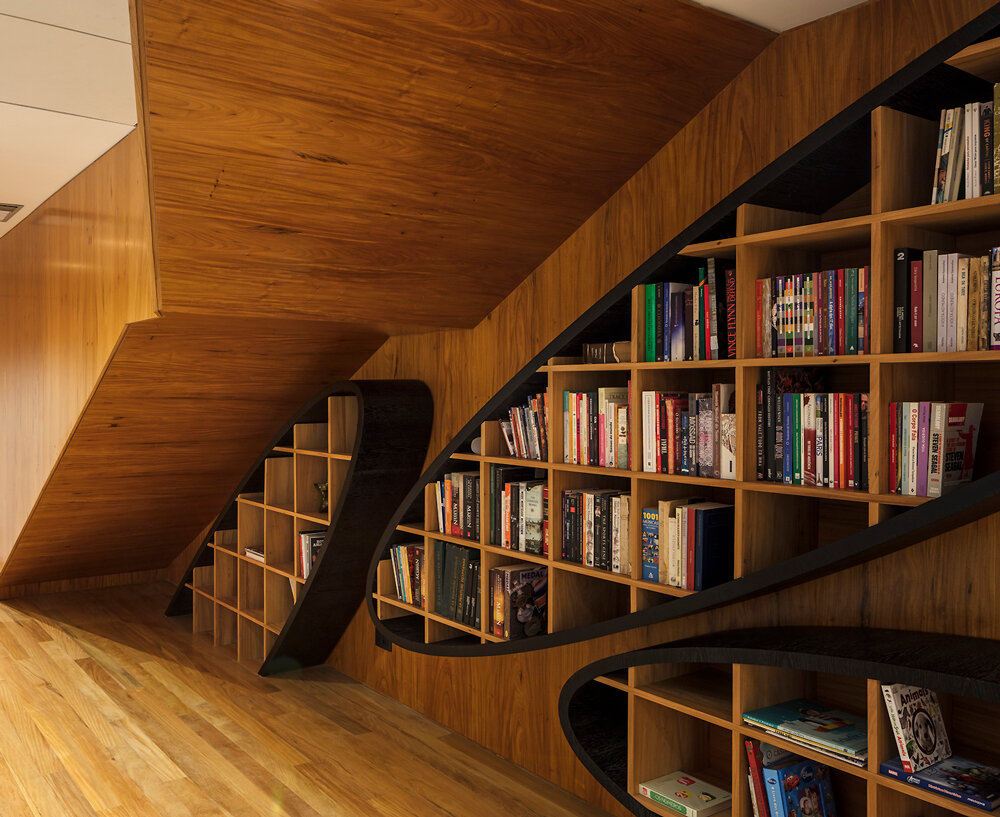 the wave house resembles a vessel sailing through rio de janeiro's waters