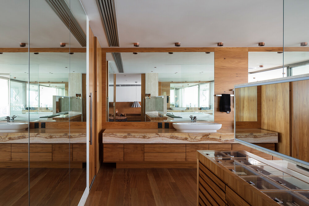 the wave house resembles a vessel sailing through rio de janeiro's waters